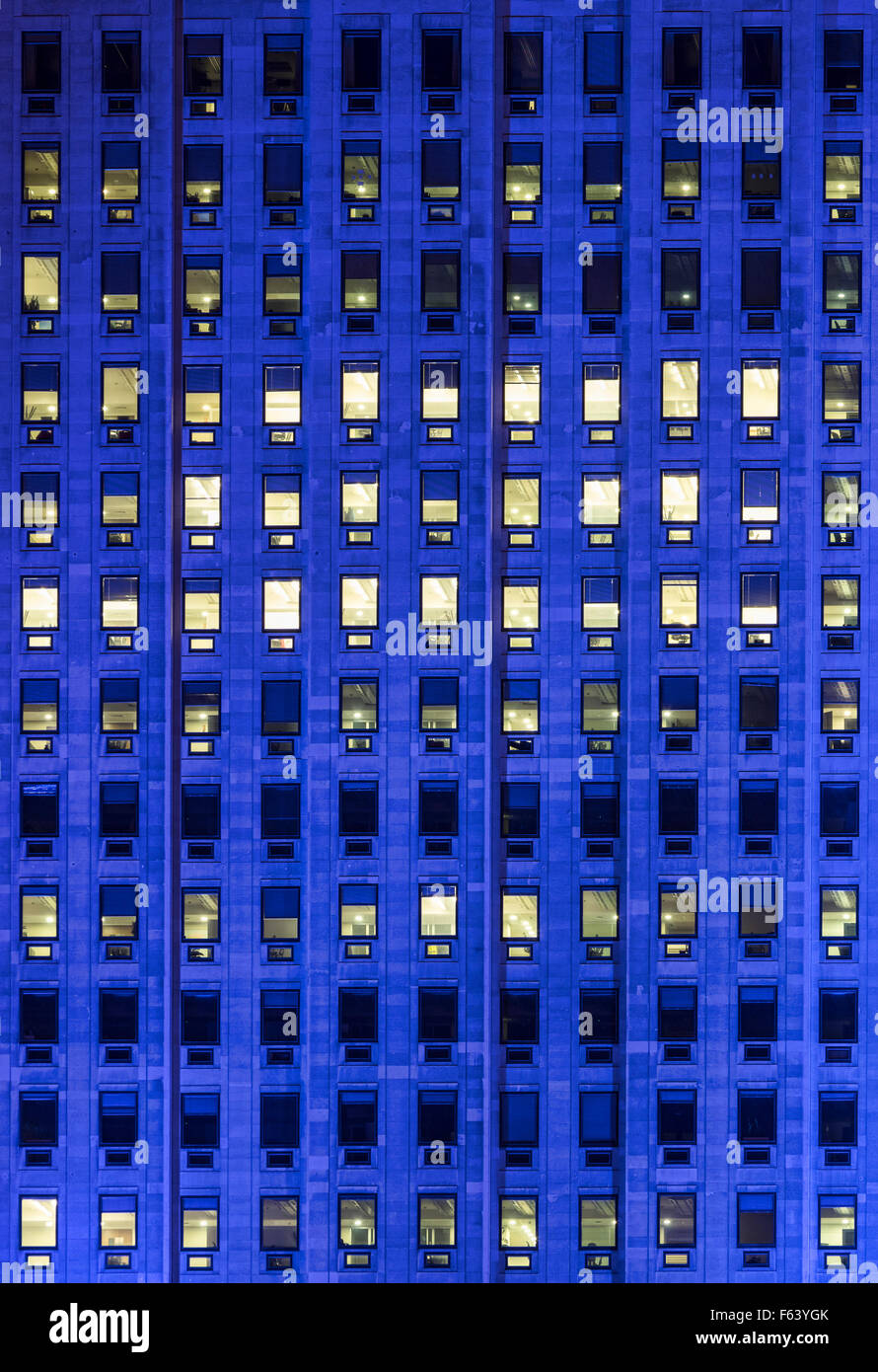 exterior blue light on windows on a hight office building Stock Photo ...
