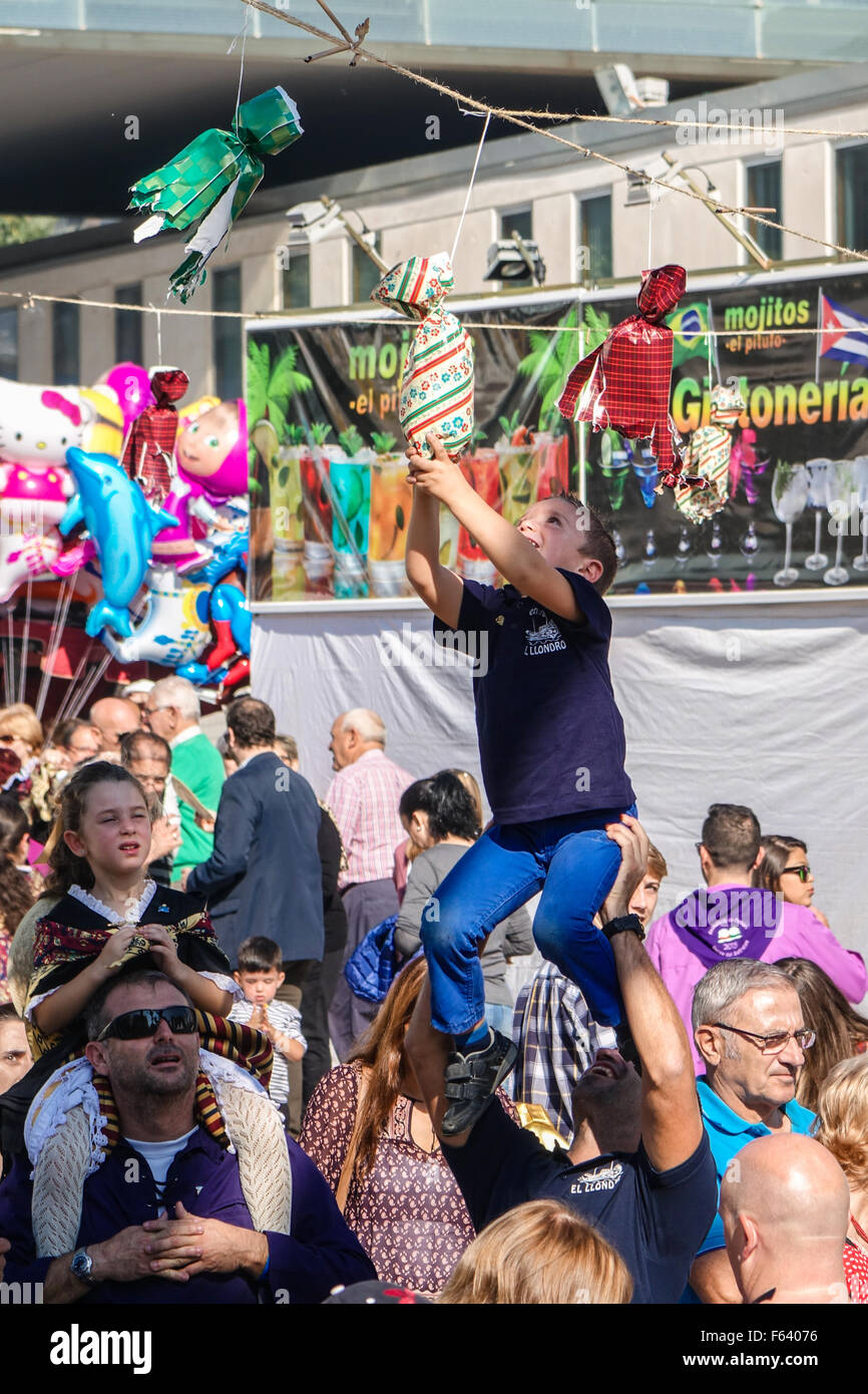 Benidorm, Spain. 11th November, 2015. Locals and tourists scramble to ...