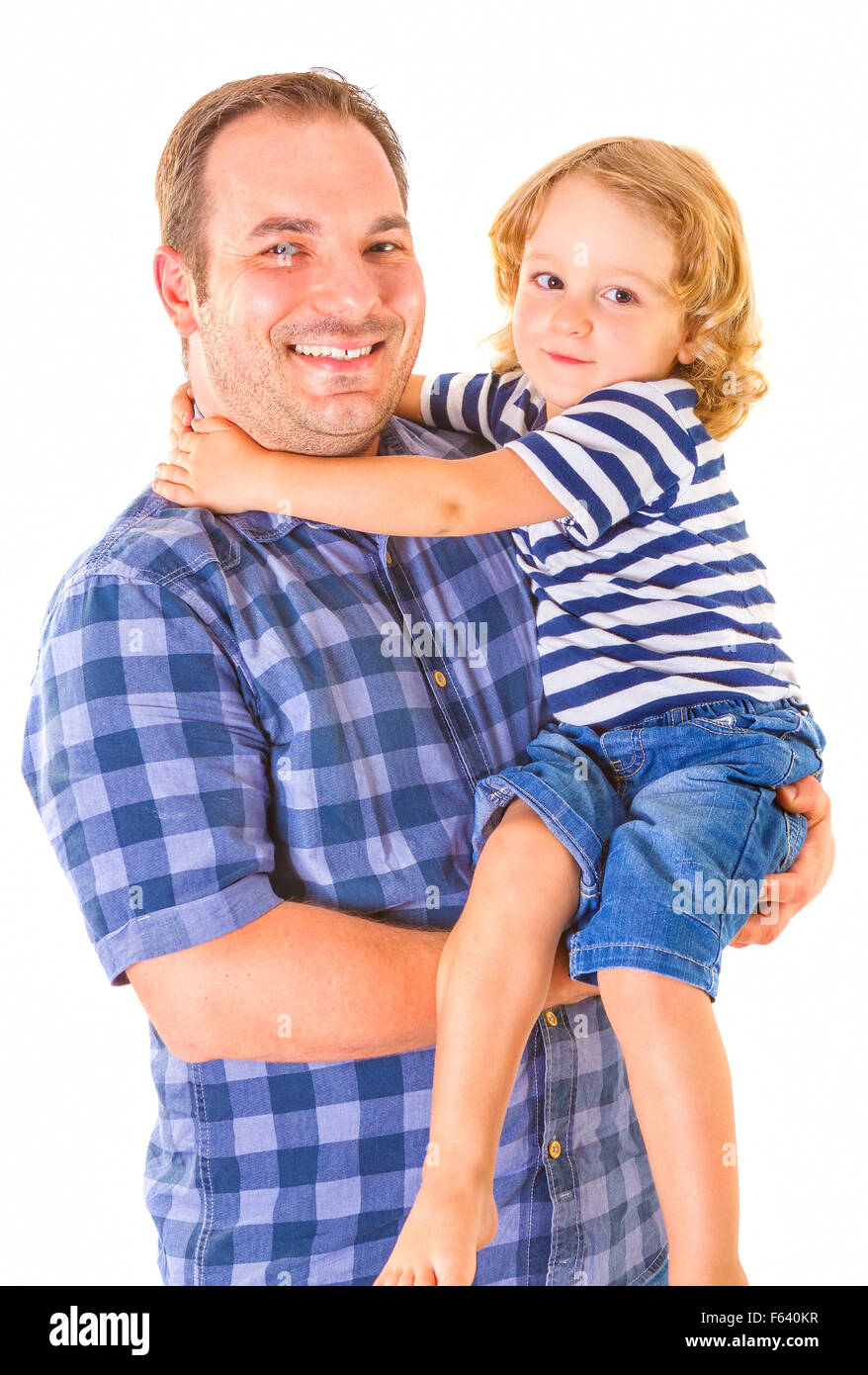 Portrait of young attractive smiling father playing with his little ...