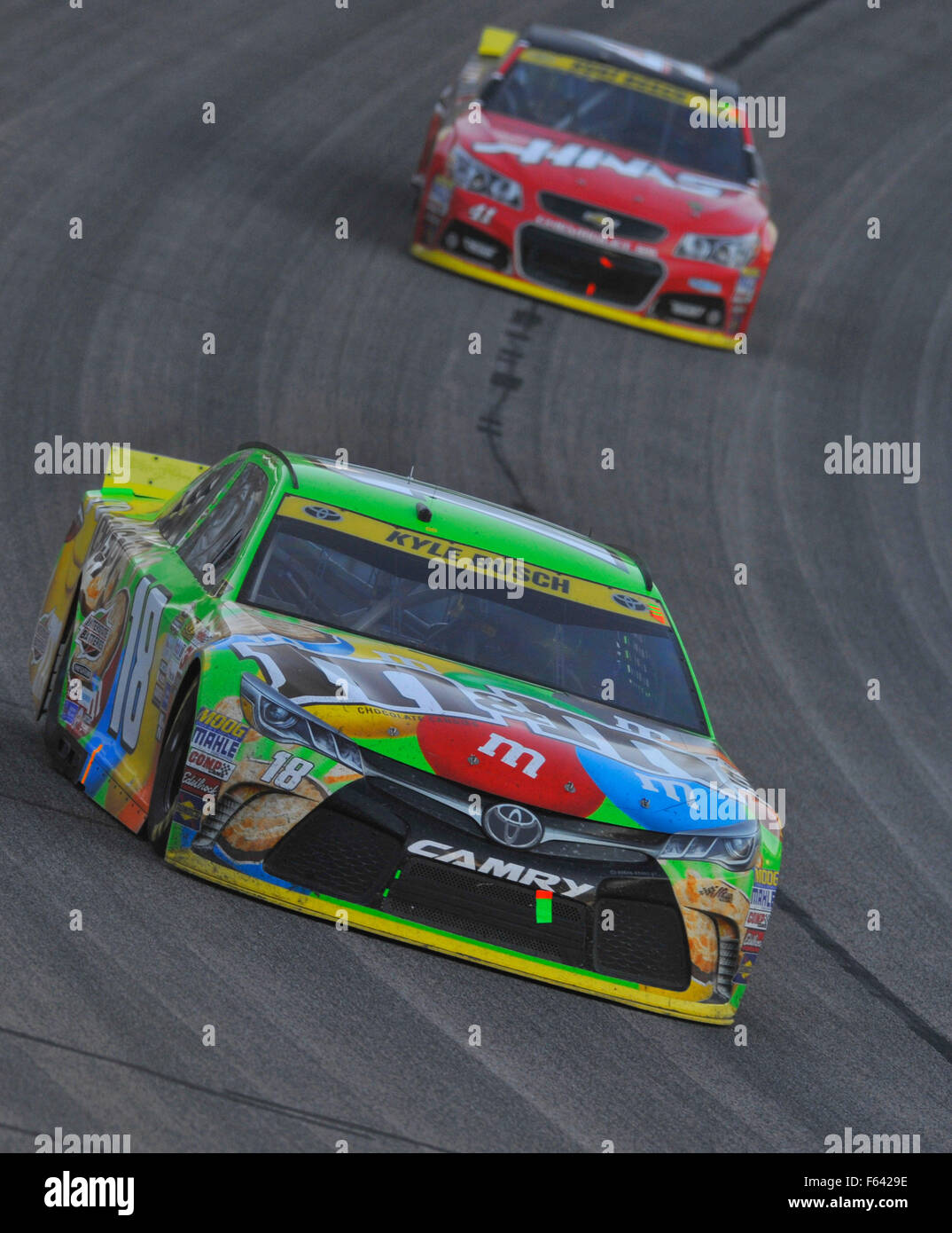 November 8, 2015: Kyle Busch (18) of the M&M's Crispy Toyota leads Kurt ...