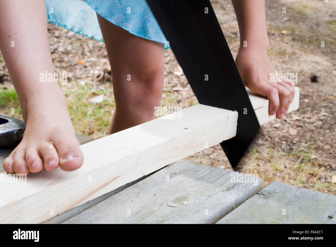 Children trying carpentry Stock Photo - Alamy