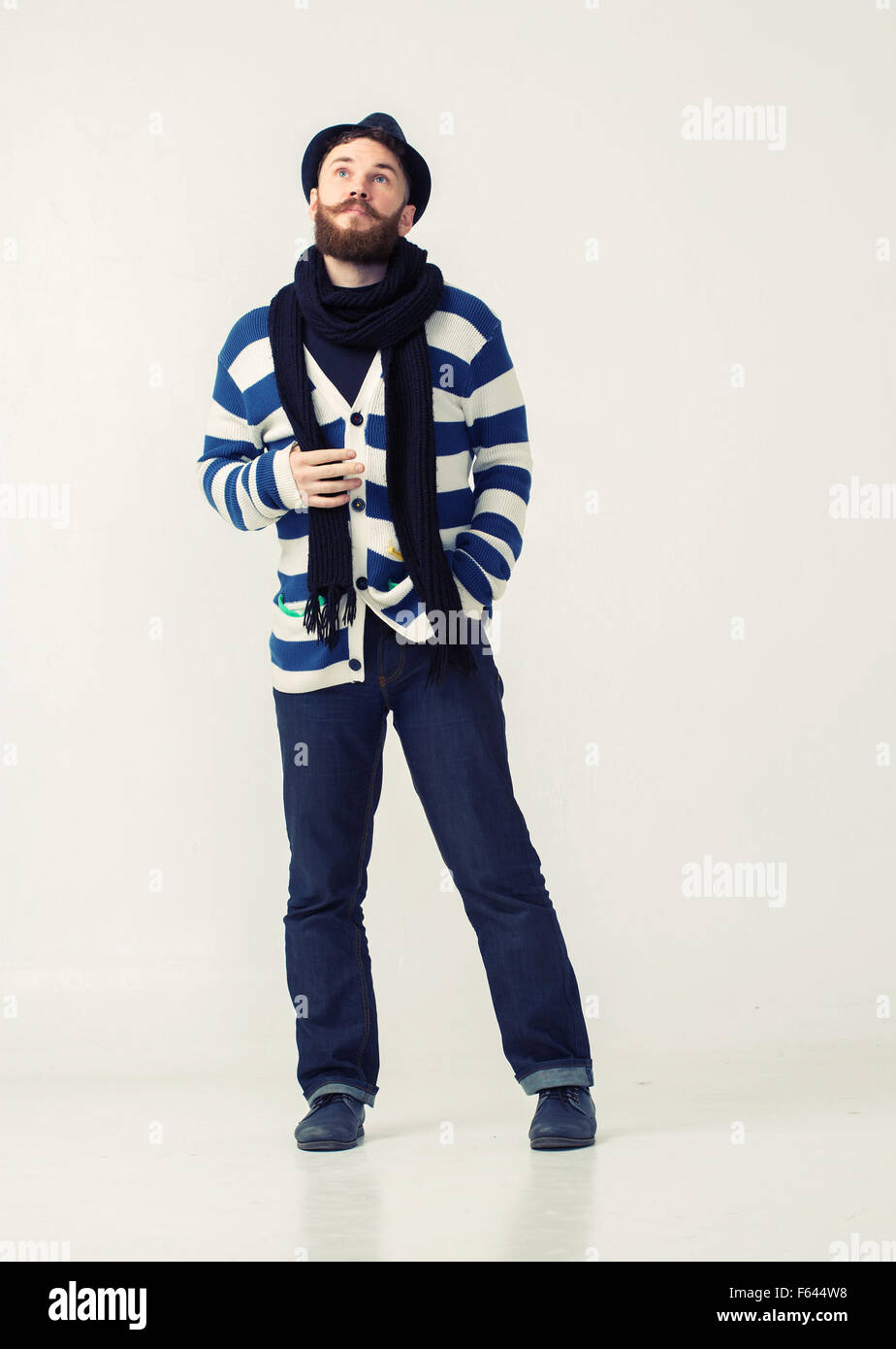 man with a big beard and mustaches in cap full length studio Stock ...