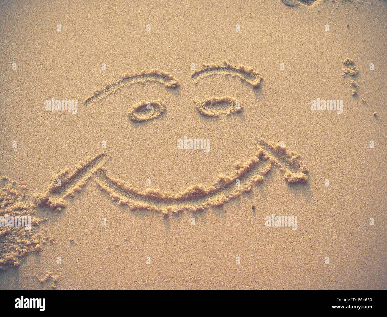 Smiling Face on Sand - Similan Islands, Thailand Stock Photo - Alamy