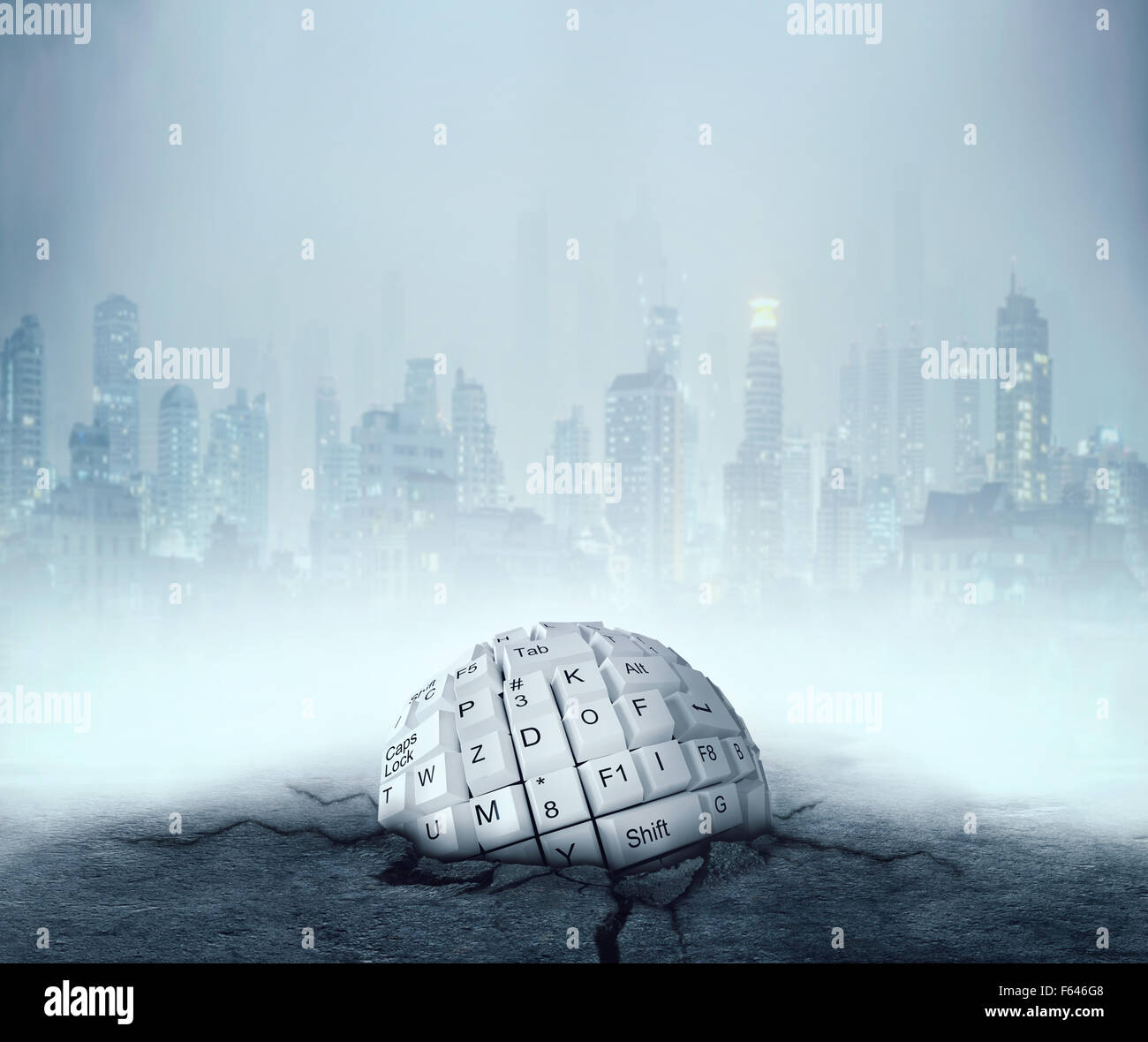 Keyboard in the form of a ball in the ground over gray Stock Photo - Alamy