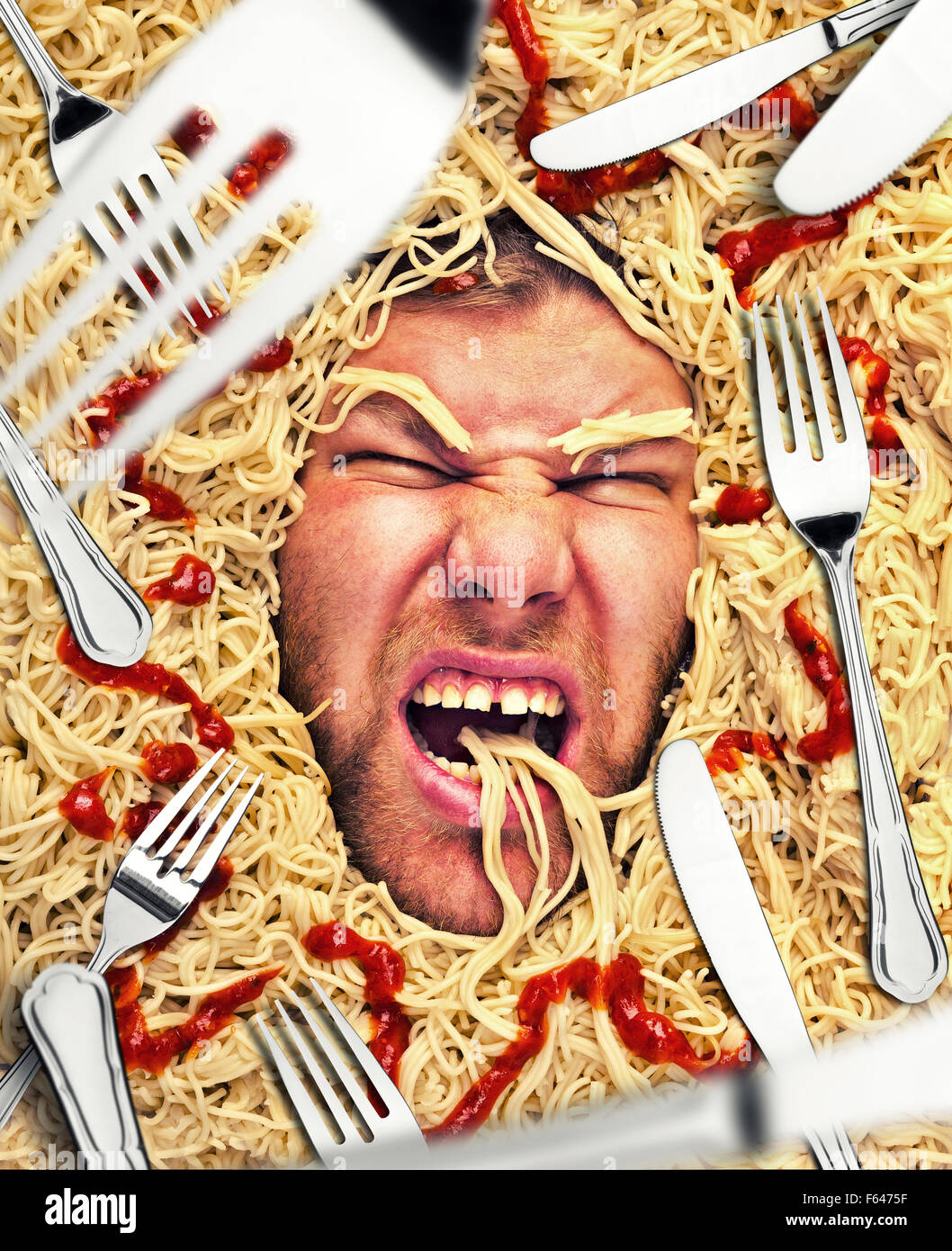 Man eating pasta, dinner time Stock Photo - Alamy