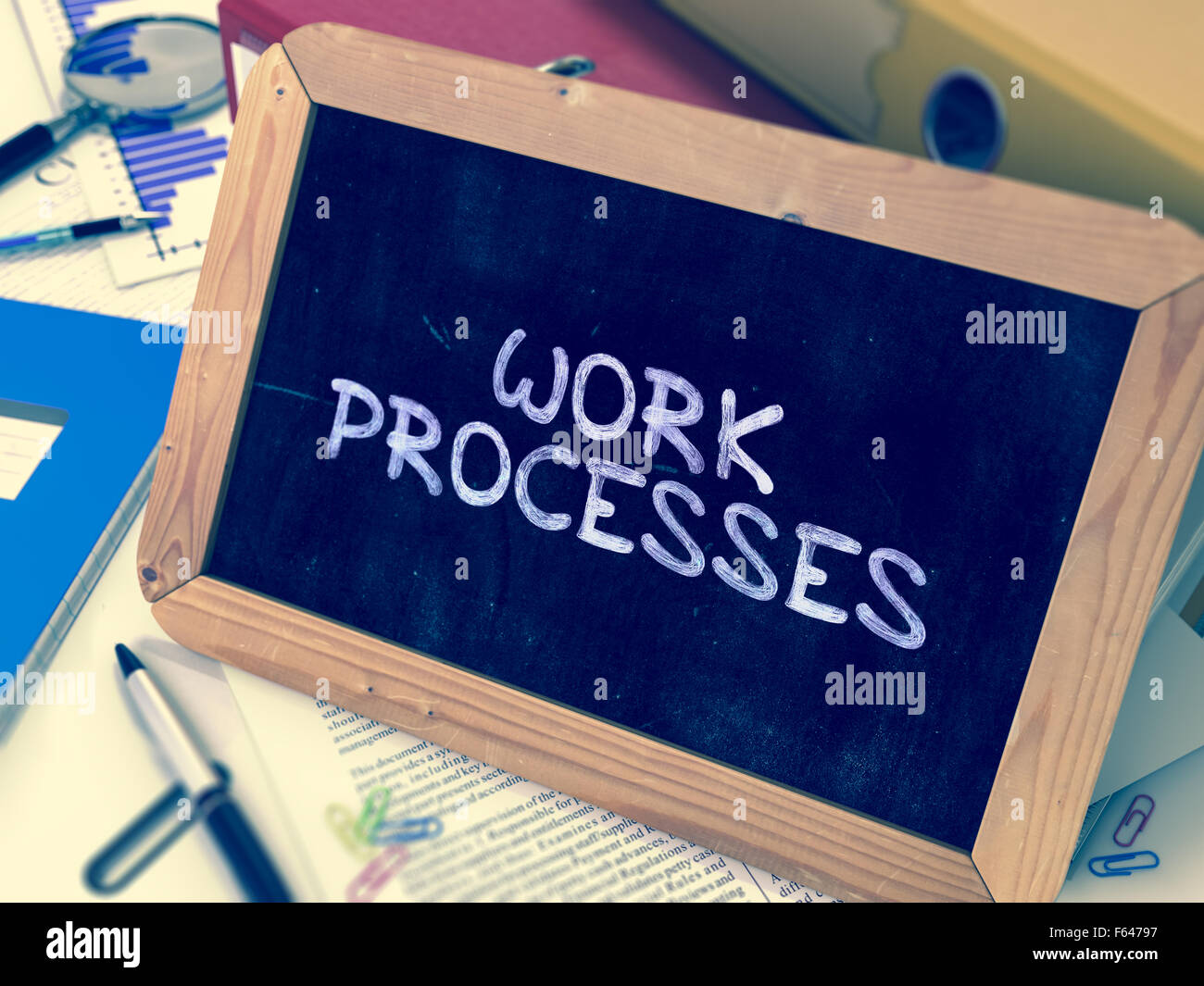 Work Processes Handwritten on Chalkboard. Composition with Small ...