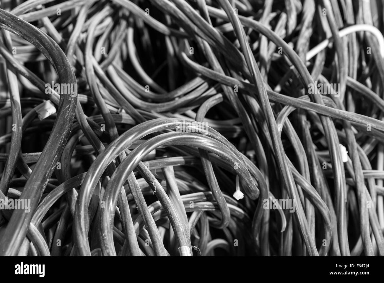 Bended gray wires for background Stock Photo - Alamy