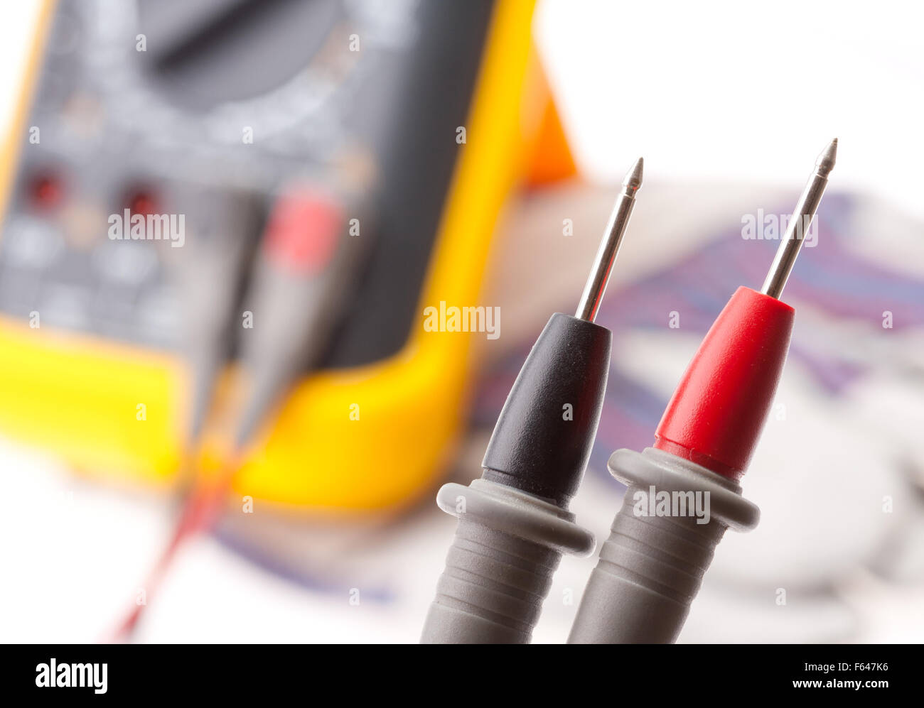 Red and black probes against digital multimeter Stock Photo - Alamy