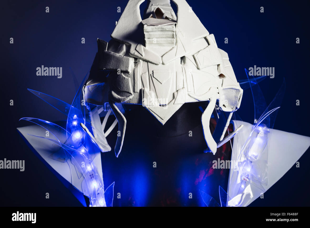 cyber robot, white suit with transparent plastic and LED lights on the ...