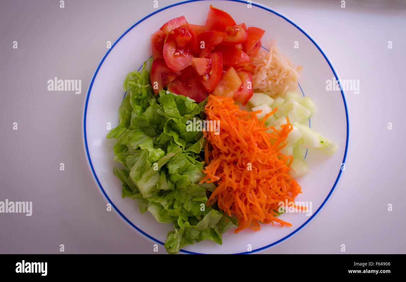 Plate of Salad isolated on white Stock Photo - Alamy
