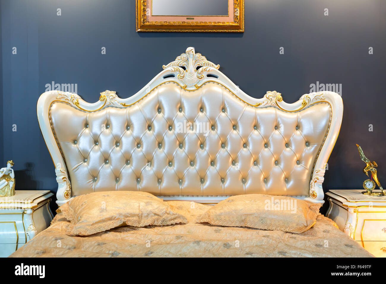 Classical bed in typical contemporary setting Stock Photo - Alamy