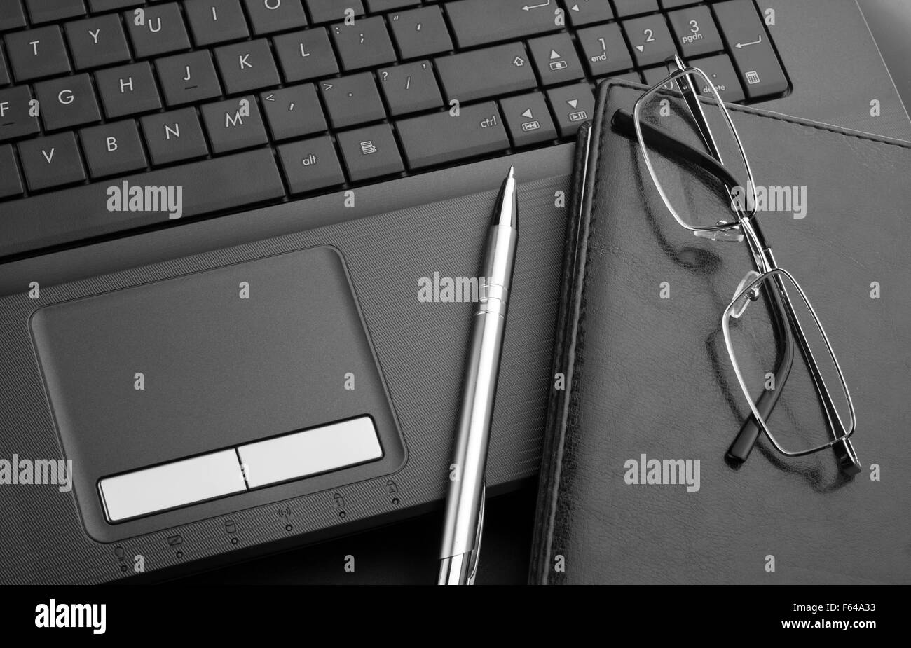Business notebook on desk Black and White Stock Photos & Images - Alamy