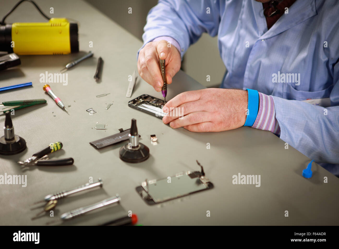 Smartphones and repair tools Stock Photo - Alamy