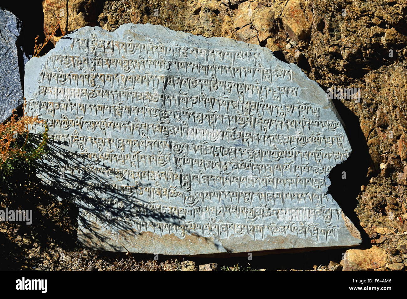 Mani stone buddhist inscriptions hi-res stock photography and images ...