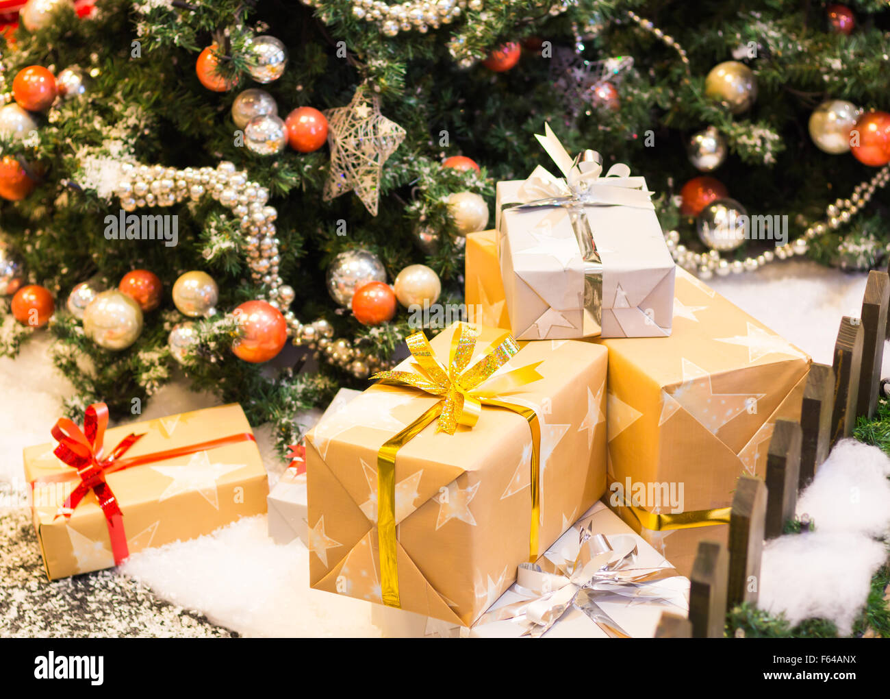 Presents under a christmas tree hi-res stock photography and images - Alamy