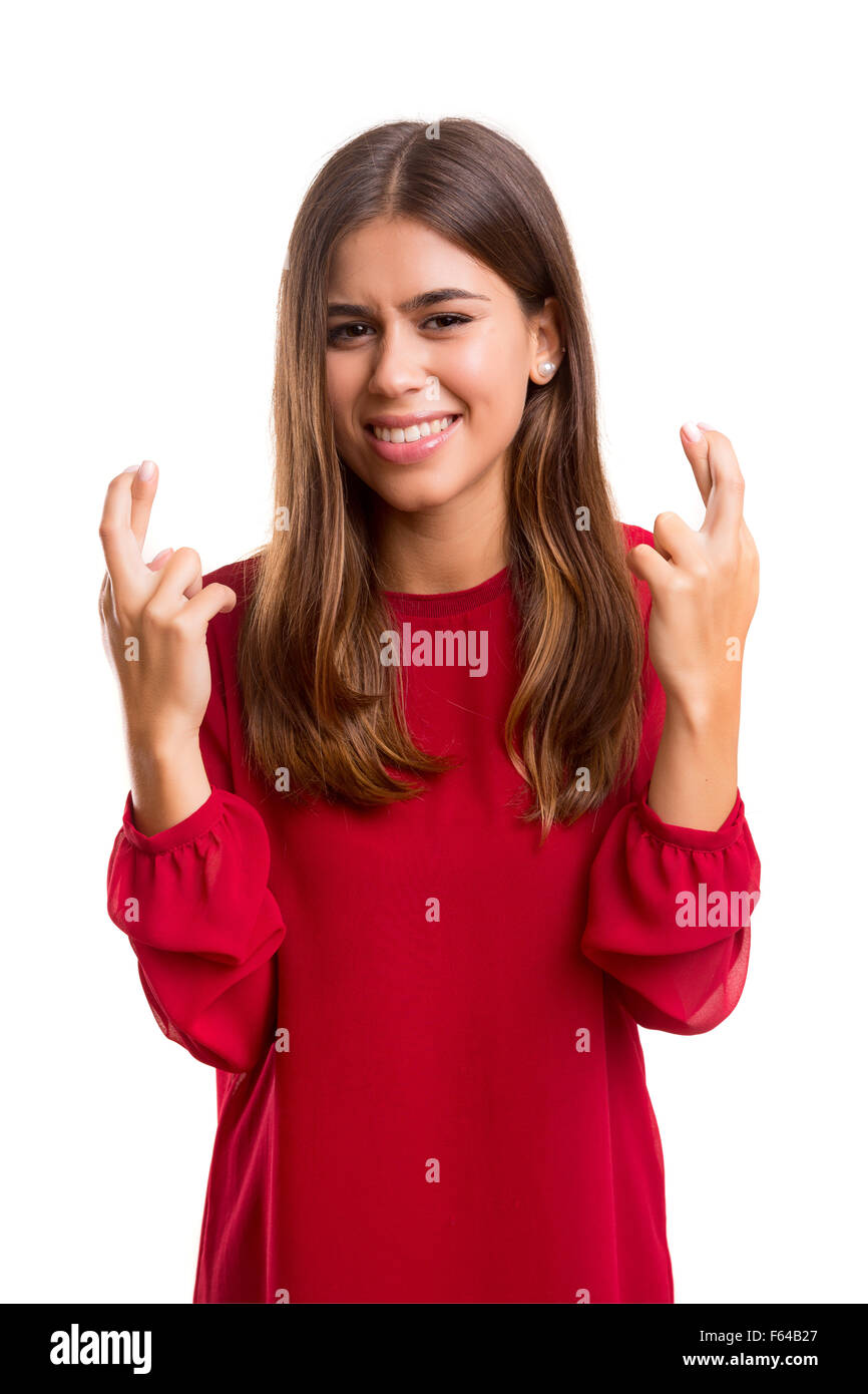 Woman with crossed fingers, isolated over a white background Stock ...