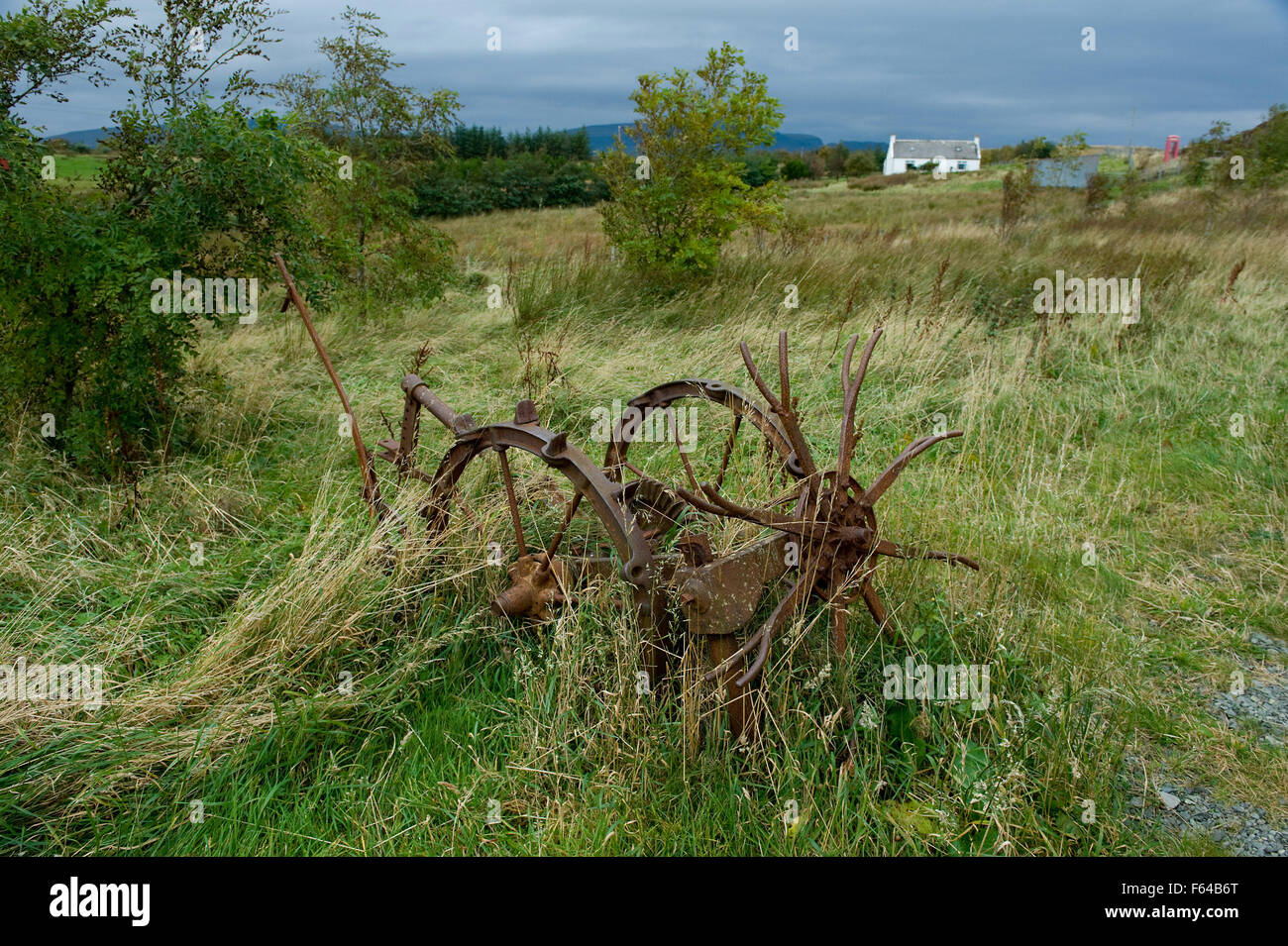 View of landscape and old rustic farm equipment on Isle Of Skye Stock ...
