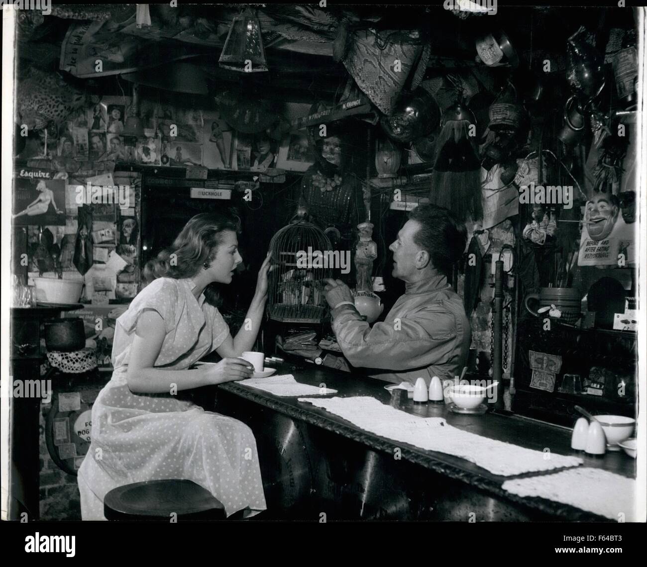 1960 - Man Shows Shirley Burniston his musical bird cage, as she has ...