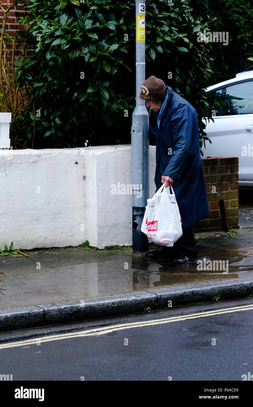 Lone man walking through hi-res stock photography and images - Alamy