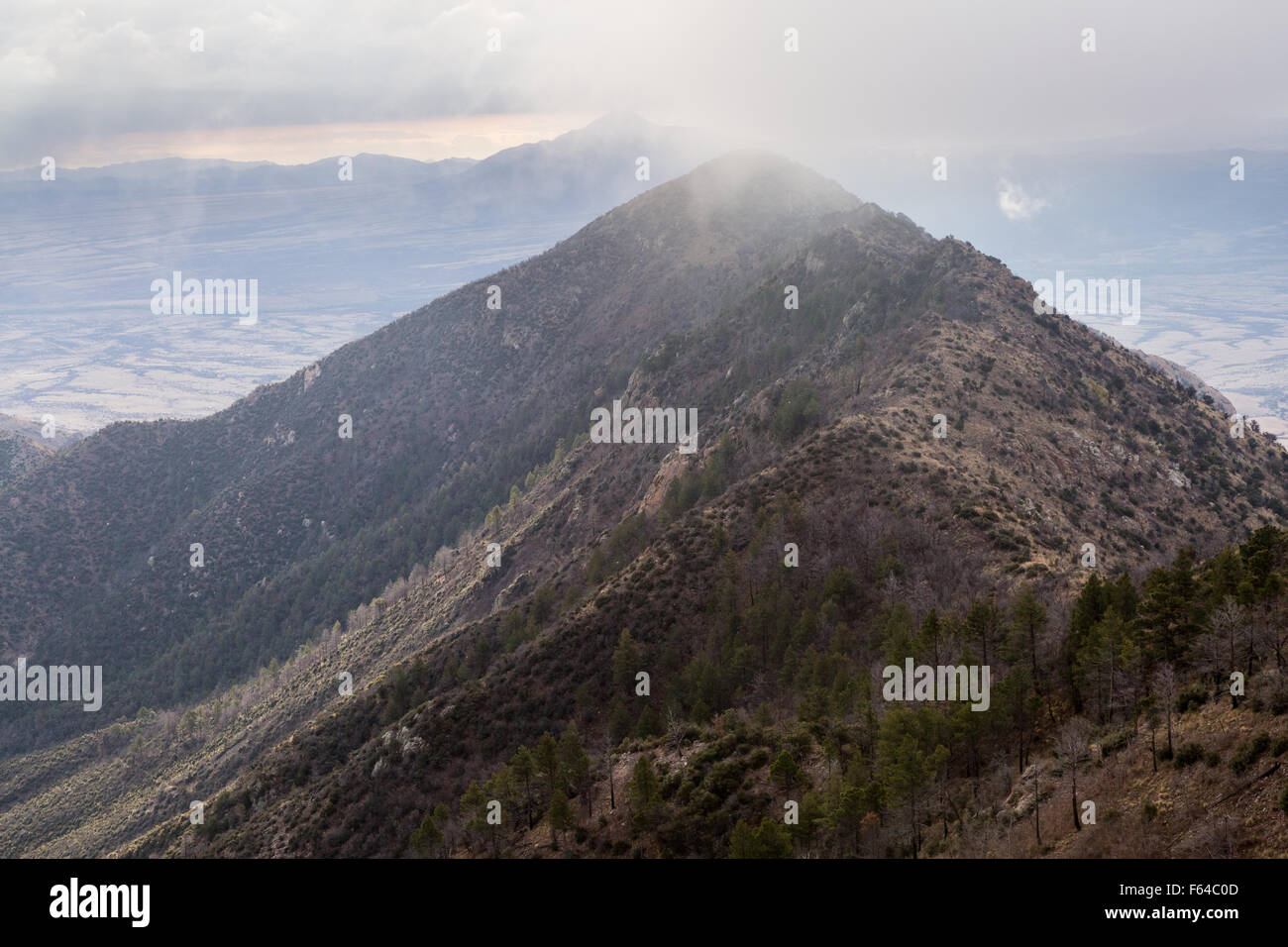 Rain and sleet falling above the Huachuca Mountains, Miller Peak ...