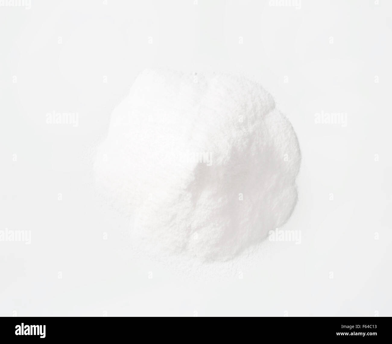 handful of cooking soda on white background Stock Photo - Alamy