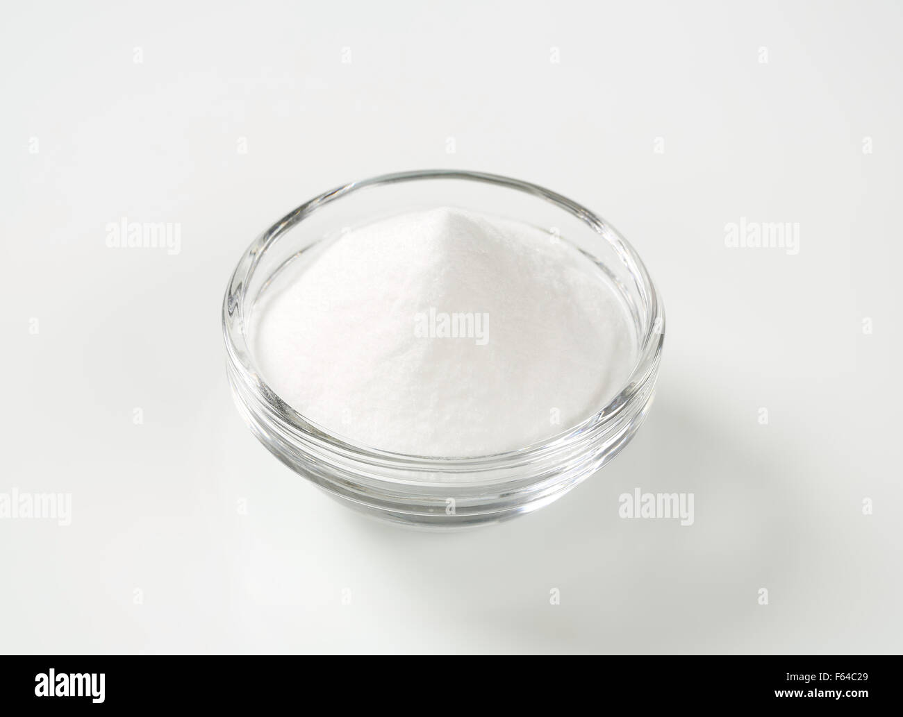 bowl of cooking soda on white background Stock Photo - Alamy