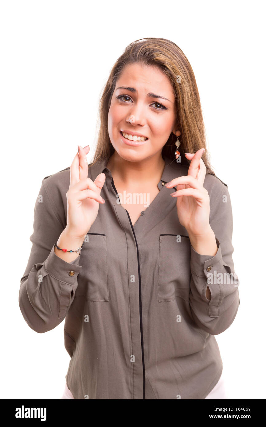 Woman with crossed fingers, isolated over a white background Stock ...