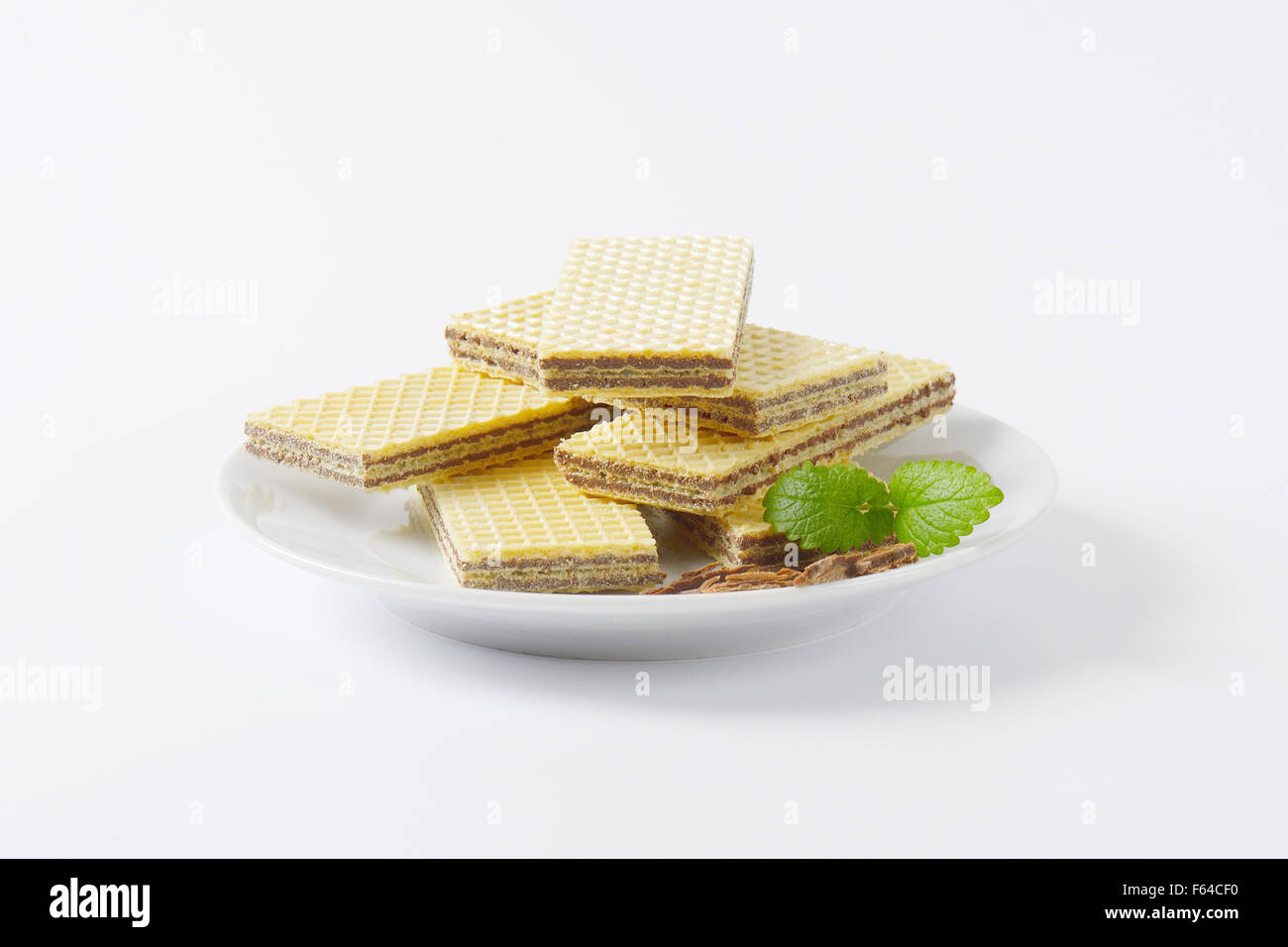 stack of chocolate wafers on white plate Stock Photo - Alamy