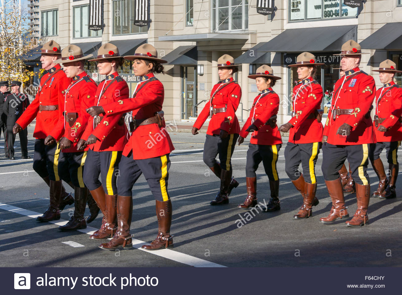 Members of the Royal Canadian Mounted Police marching down Saint Stock ...