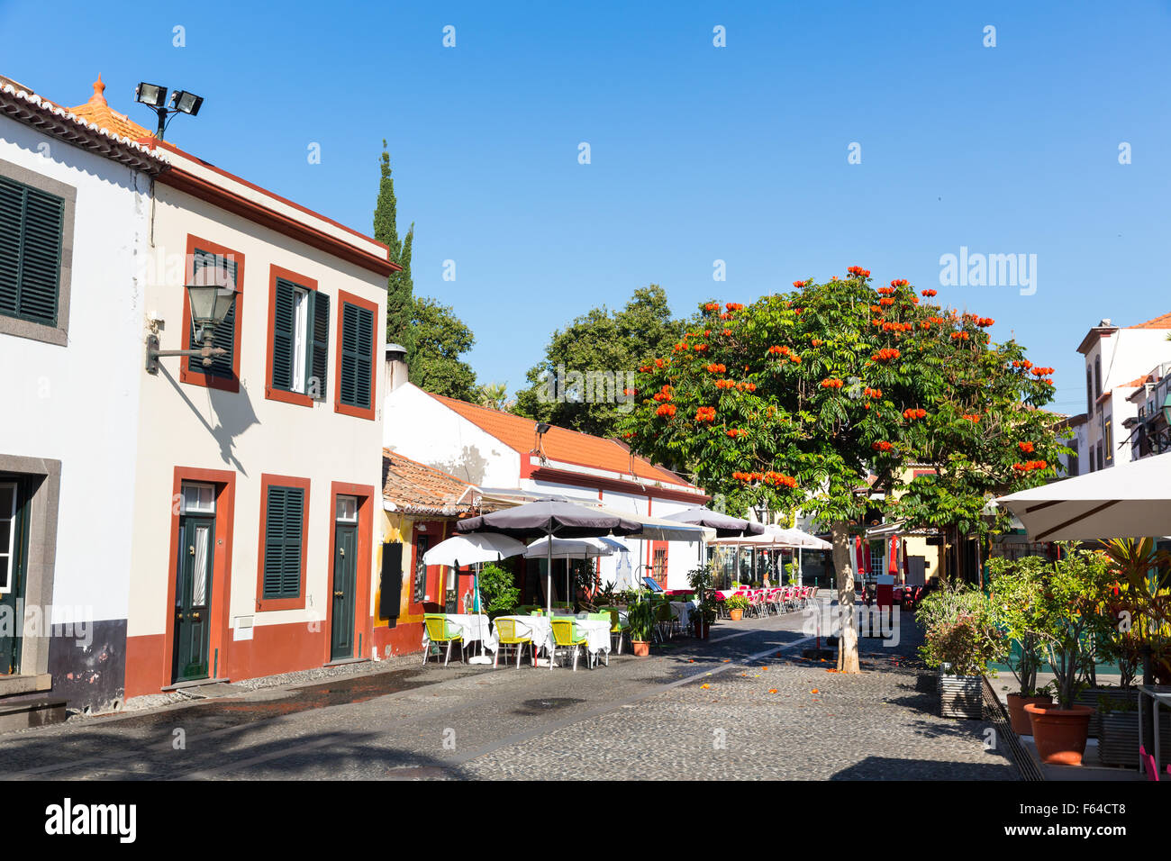 Restaurant outside in european street in summer Stock Photo - Alamy