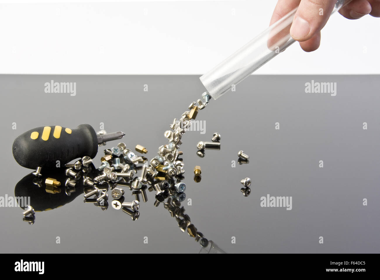 Falling screws. Prepare to repair Stock Photo - Alamy