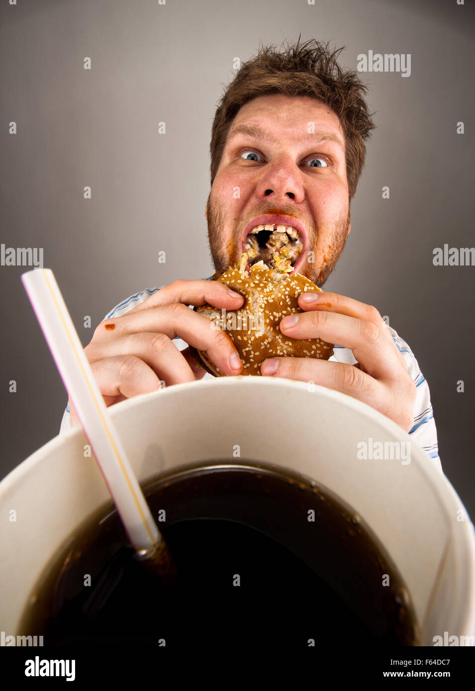 Fat men eating fast food hi-res stock photography and images - Alamy