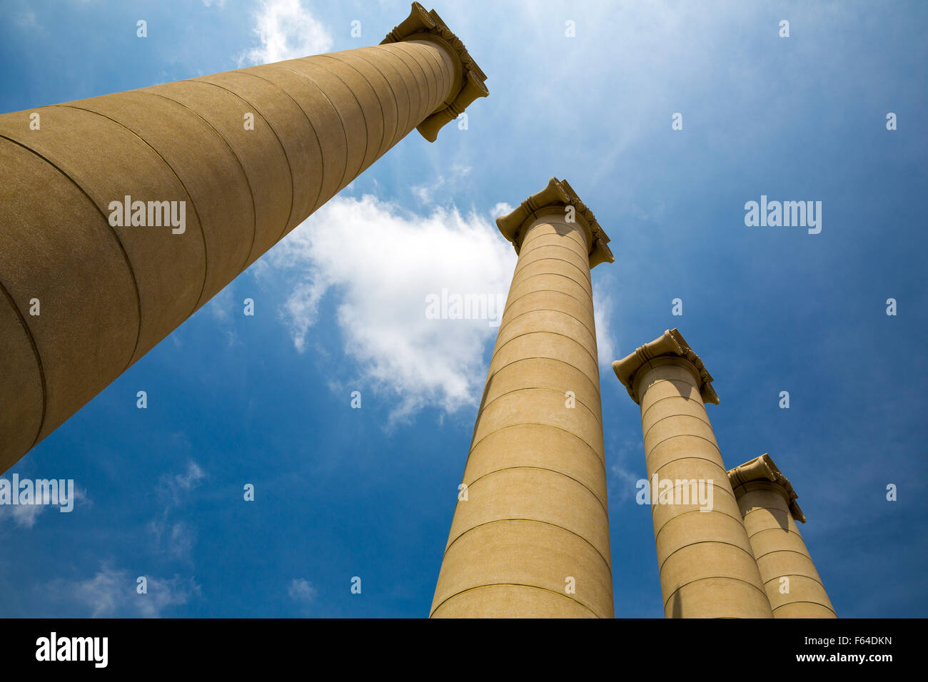 Majestic greek columns against blue sky Stock Photo - Alamy