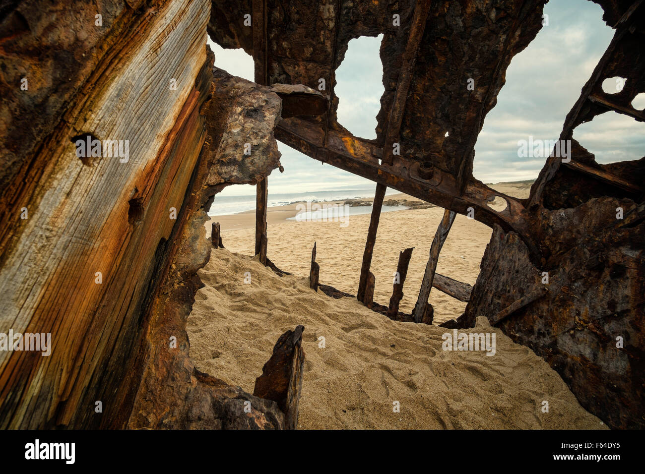 Inside a shipwreck rotting on a sandy beach Stock Photo - Alamy