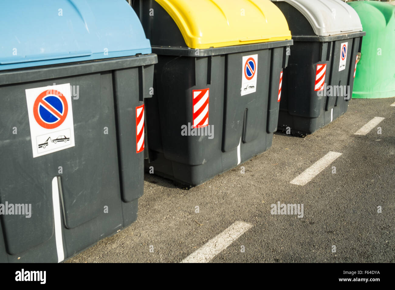 Containers in different colors to collect recyclable waste Stock Photo ...