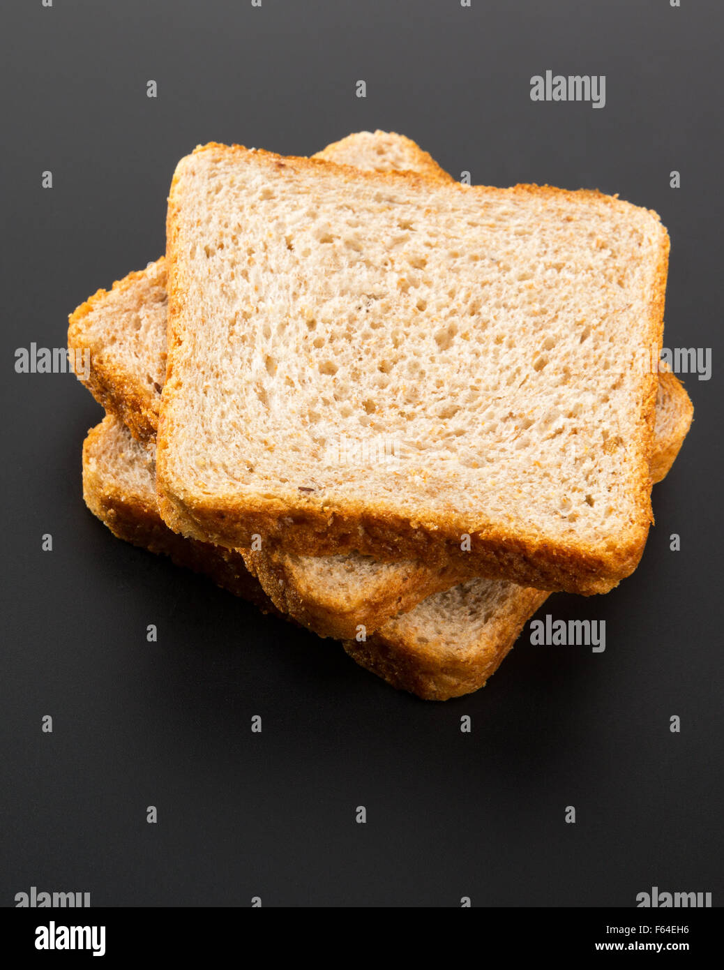 Heap of toasted white bread slices for breakfast Stock Photo - Alamy