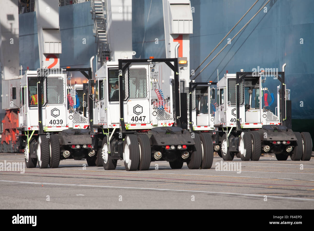 on dock vehicles for towing containers and chassis Stock Photo - Alamy