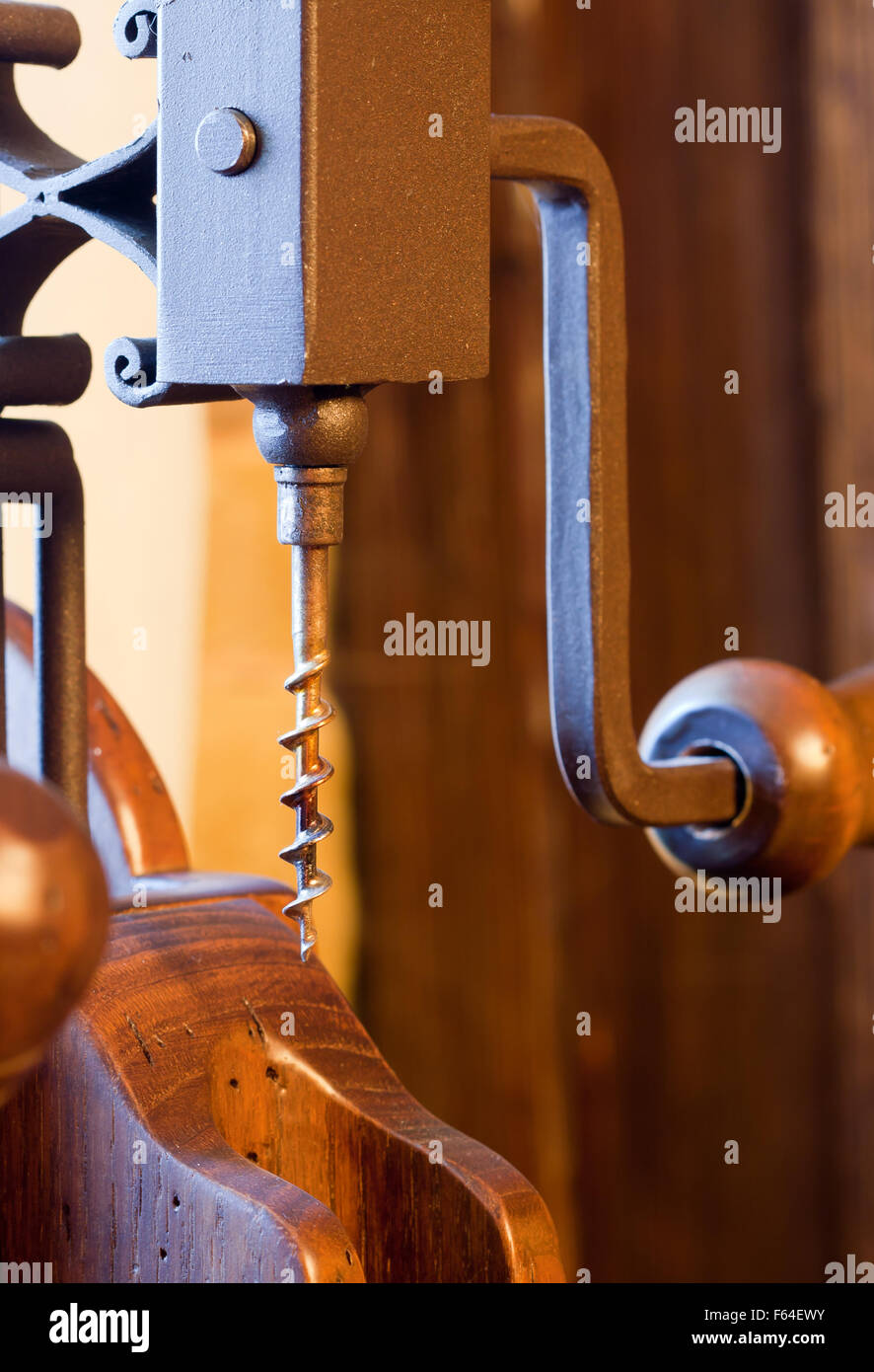 Old wooden corkscrew mechanism in antique interior Stock Photo - Alamy