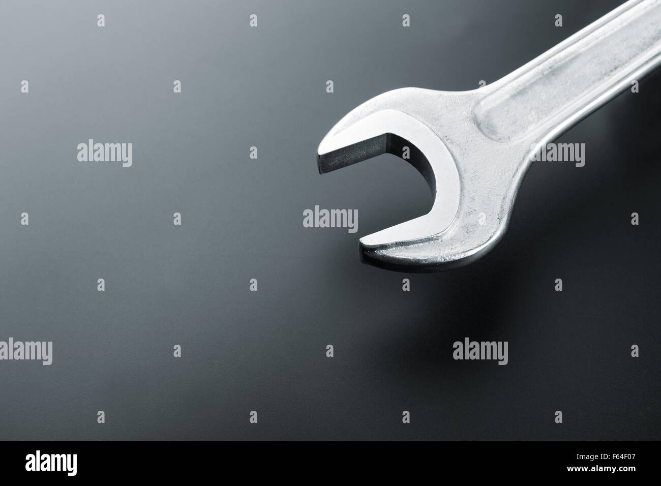 Closeup of spanner on dark background Stock Photo - Alamy