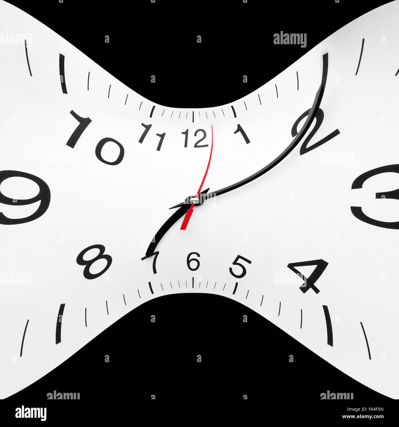 Concept of time wrap. Twisted clock face Stock Photo - Alamy