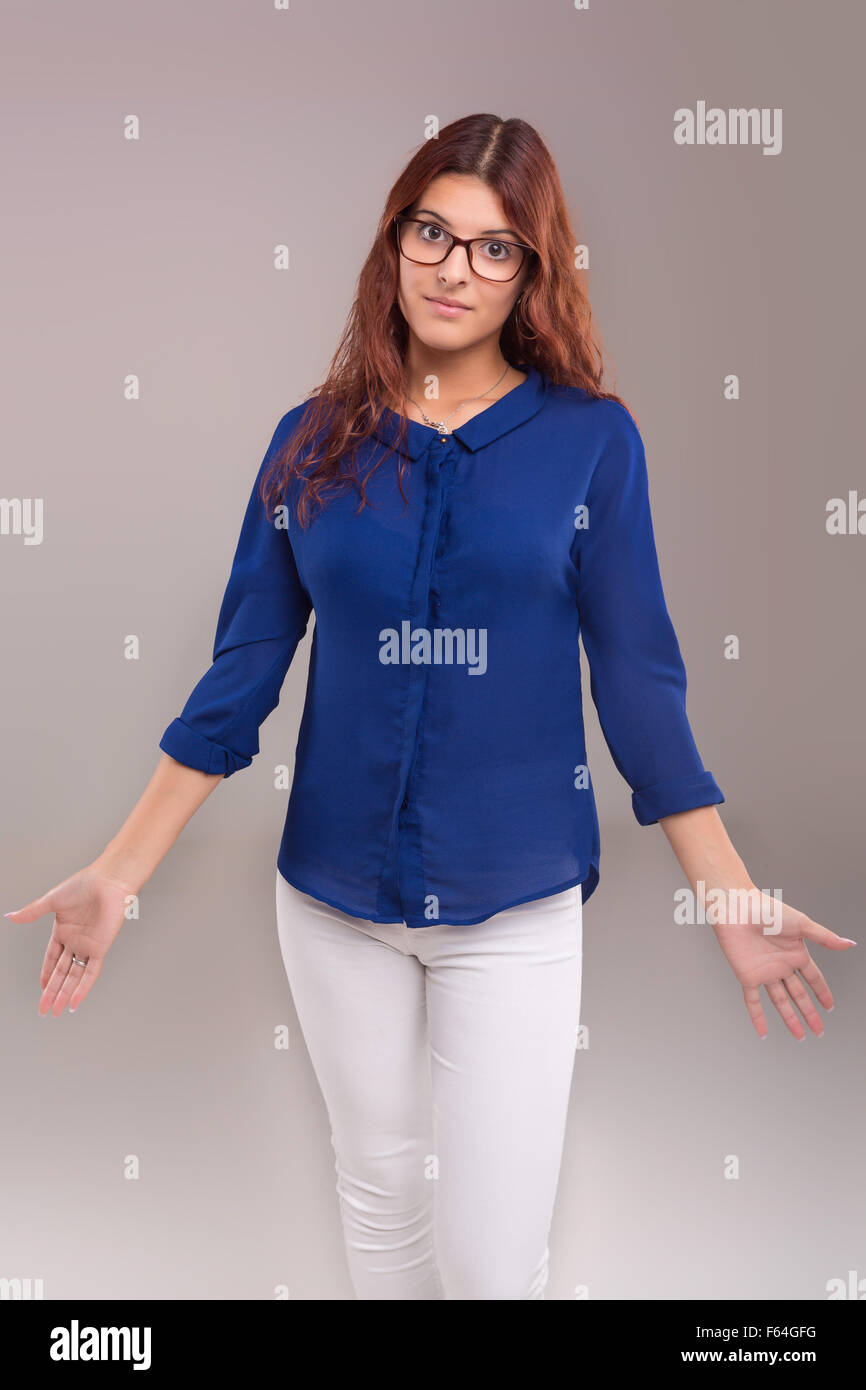 Young woman asking sorry for something she might have done Stock Photo ...