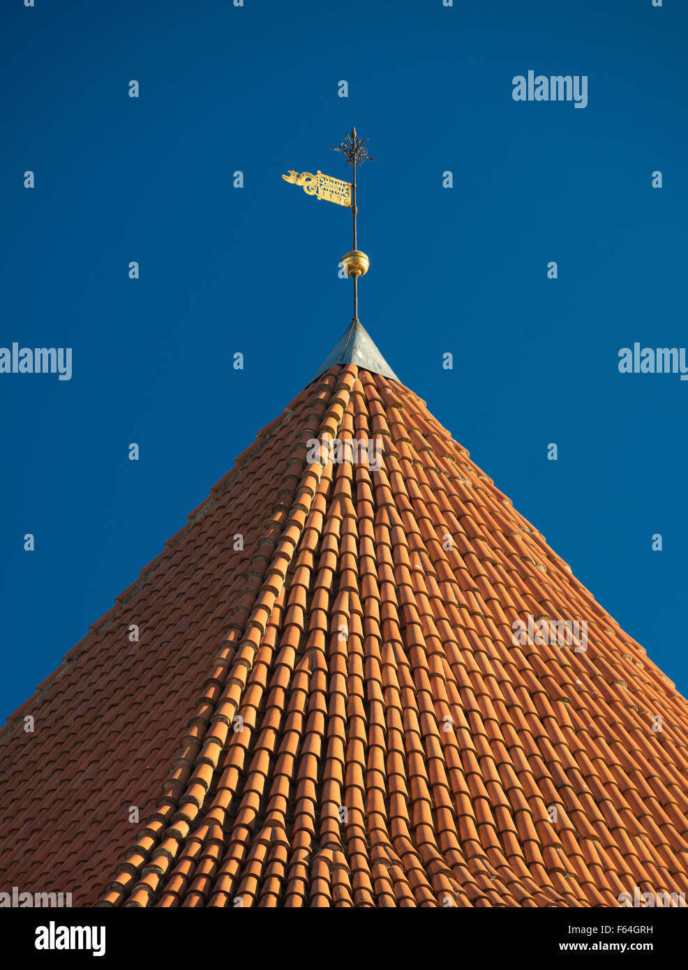 Red Tile. Spire on the roof Stock Photo - Alamy