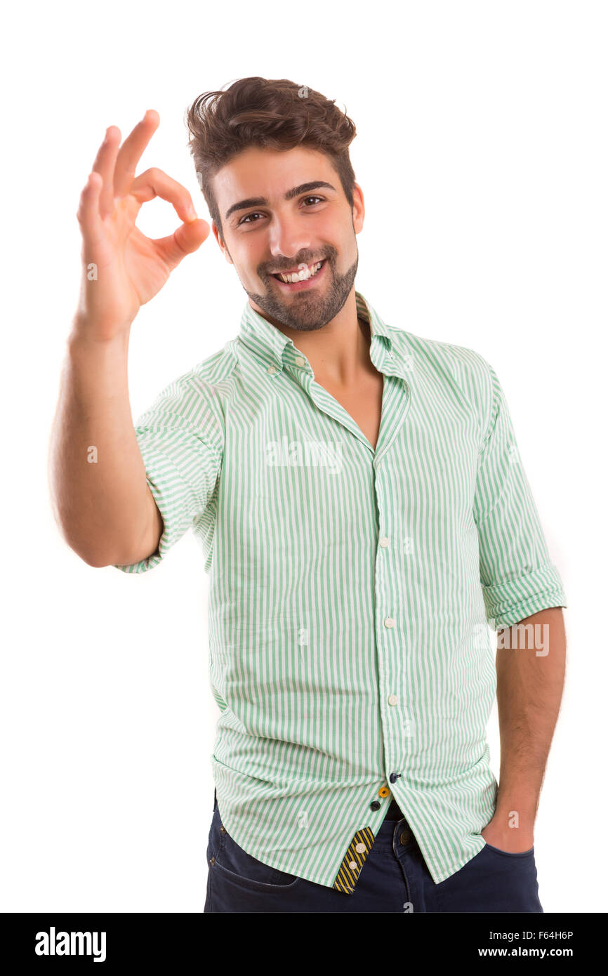 Handsome young man signaling ok, isolated over a white background Stock ...