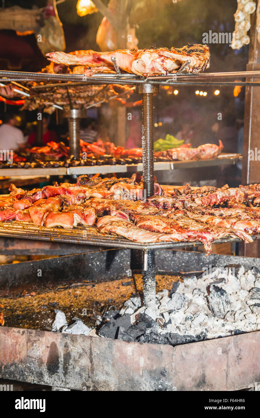 batch of meat in medieval barbecue, Spain Stock Photo - Alamy
