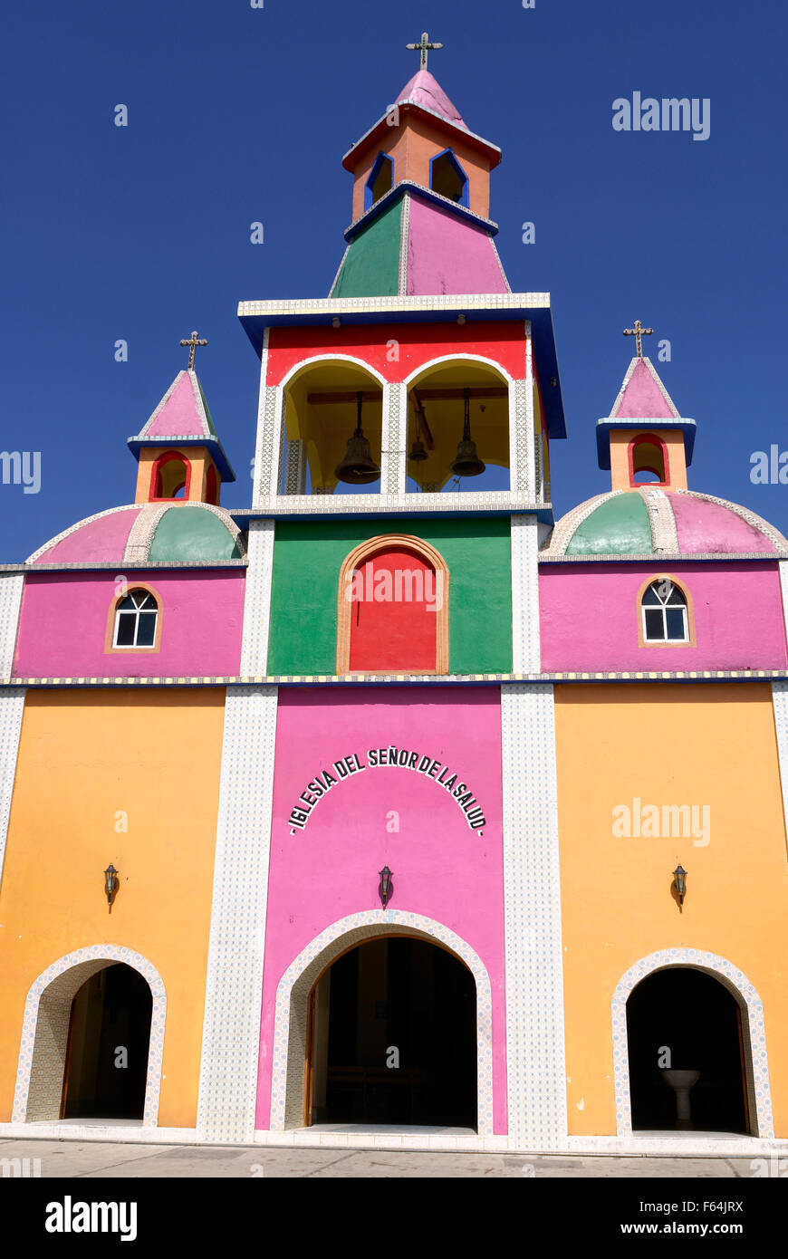 Brightly painted Mexican church at Herbolaria Beto Ramon, Aguacatitla ...