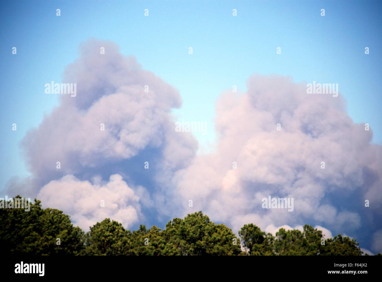 Black billowing smoke hi-res stock photography and images - Alamy