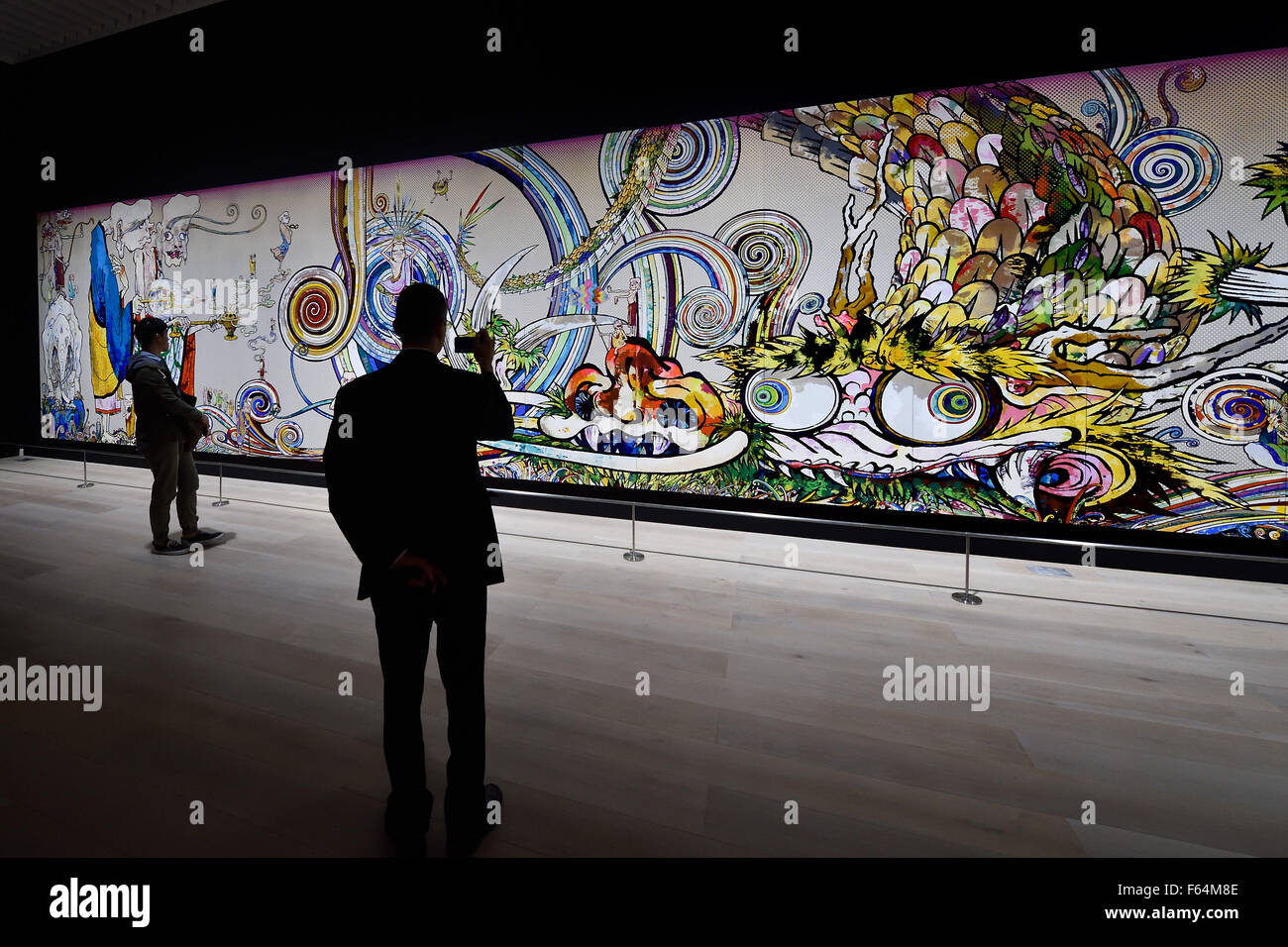 Tokyo, Japan. 11th Nov, 2015. Art patrons photograph the captivating ...