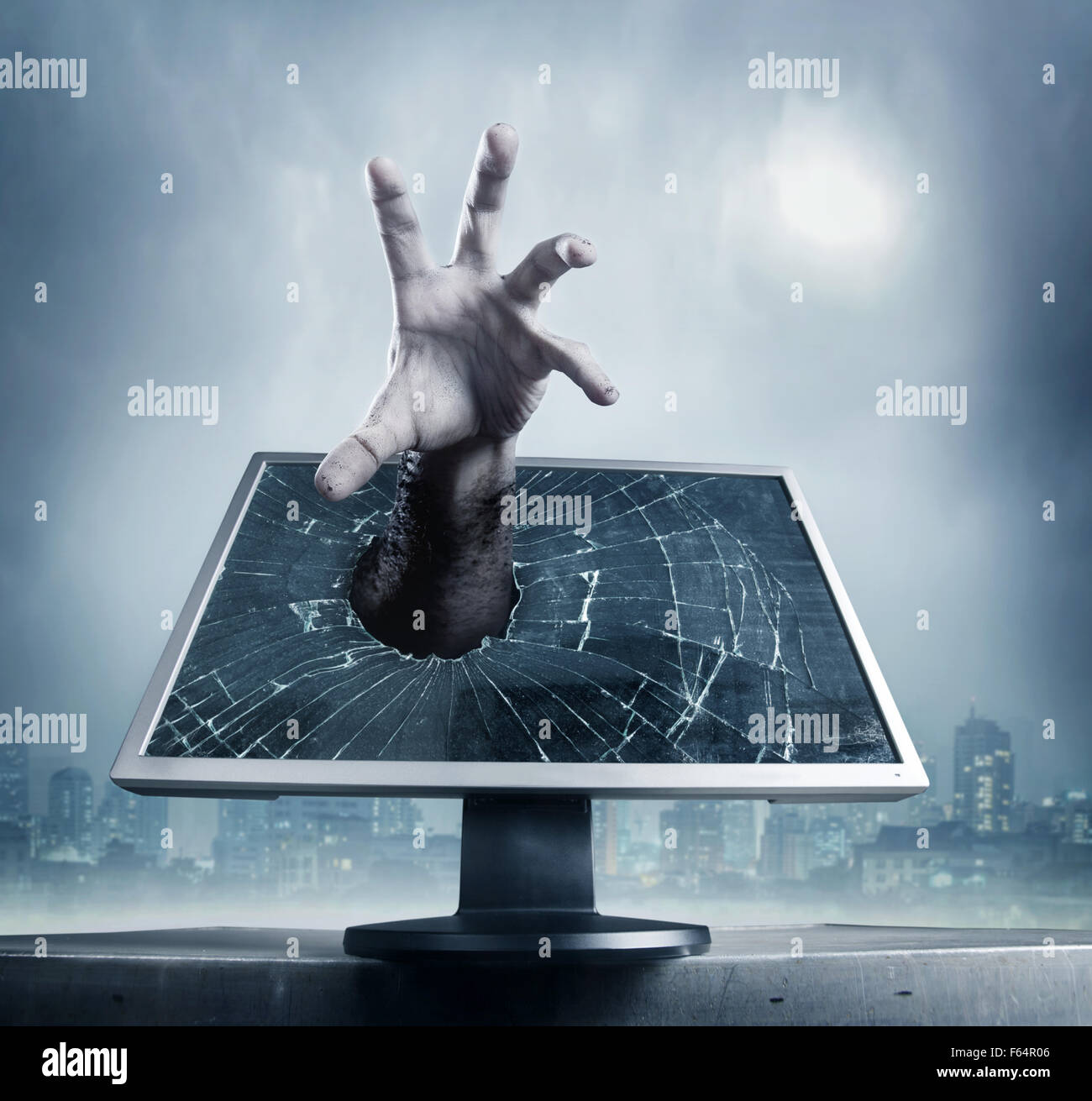 Male hand sticks from computer screen over city background Stock Photo ...
