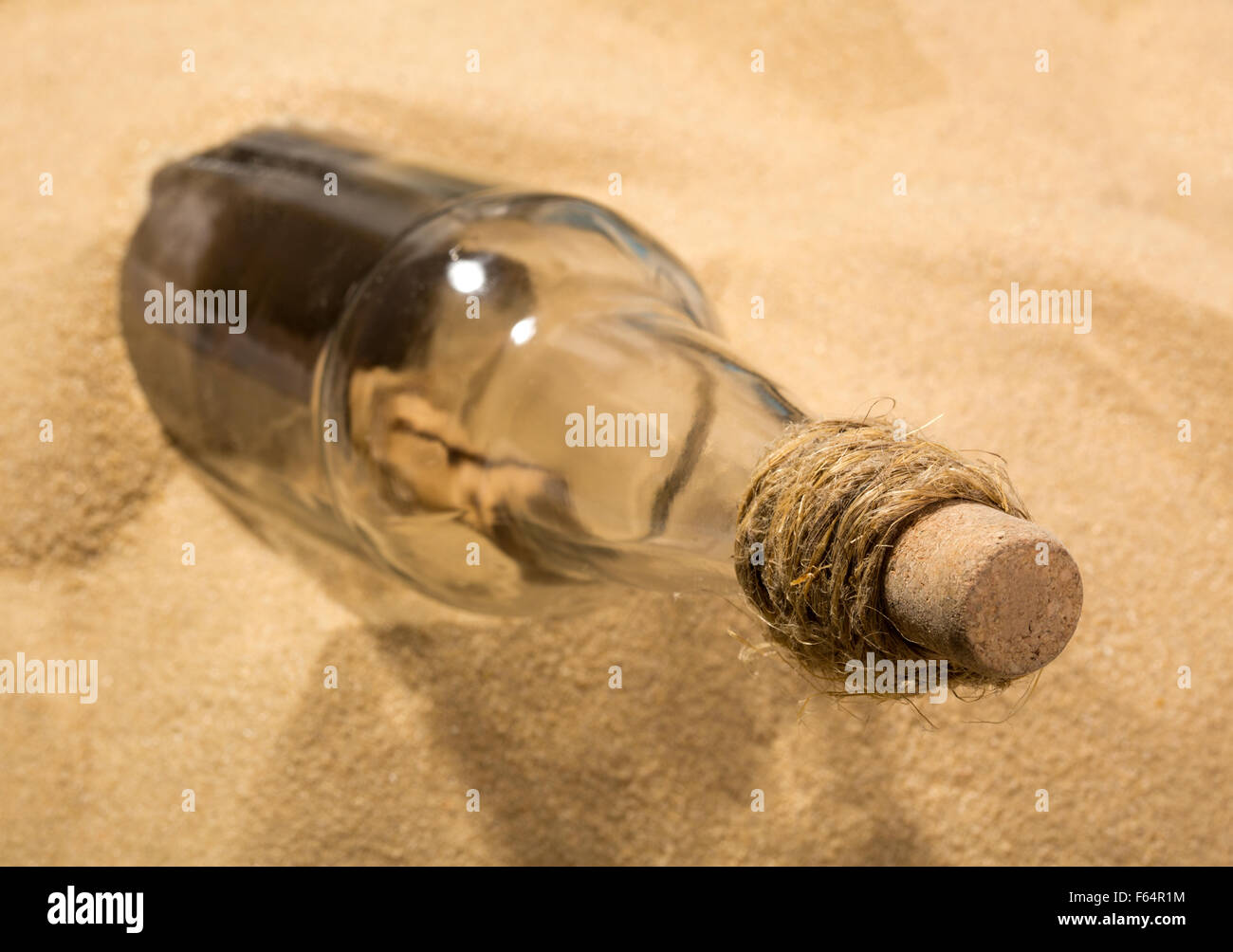 Message in a bottle on the beach Stock Photo - Alamy