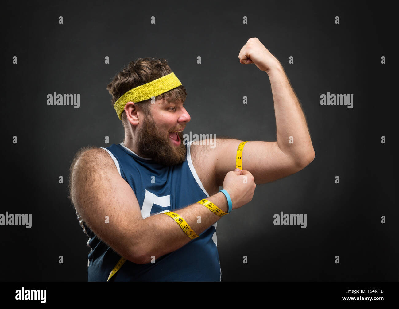 Man measuring arm muscle hi-res stock photography and images - Alamy